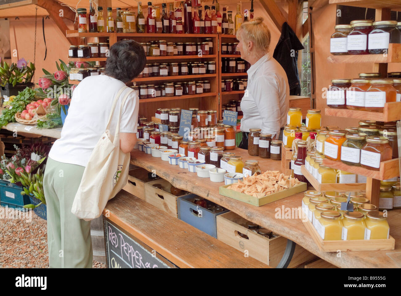 Matakana Farmers Market the seller and customer at the pickles and ...