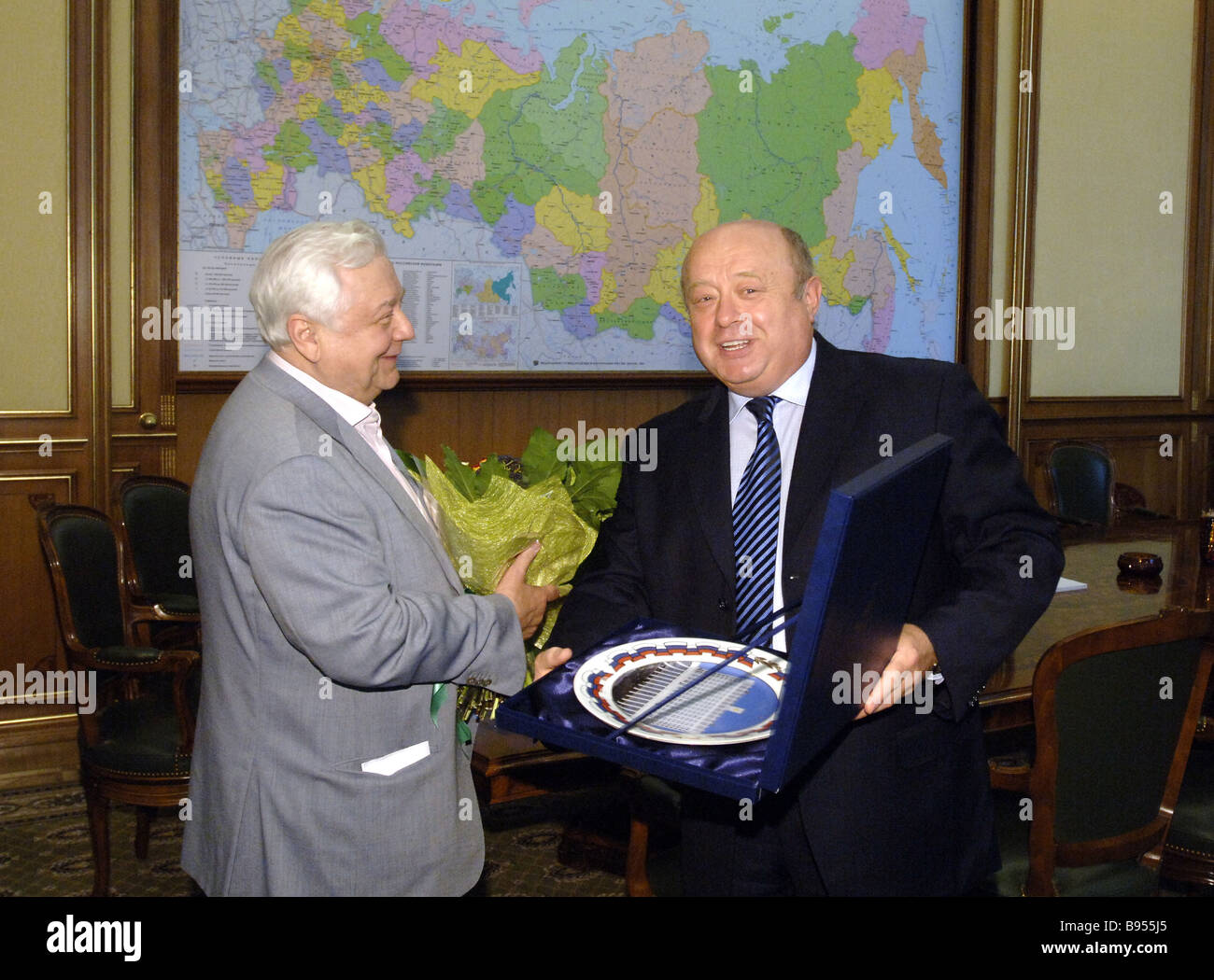 Russian Prime Minister Mikhail Fradkov right congratulating actor and ...