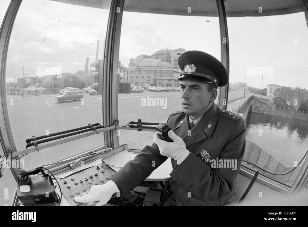 Traffic police officer watches the traffic from a specially designed ...