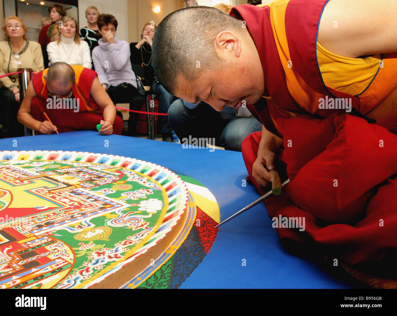 Gyudmed Tantric Monastery monks apply finishing touches to a sand ...