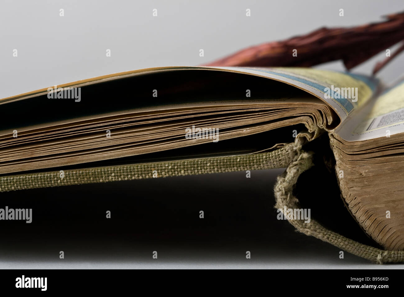 An old and worn open book Stock Photo - Alamy