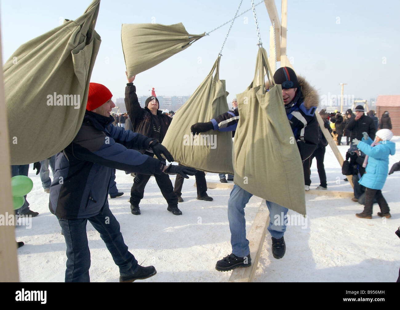 A comic sack fight during a Pancake Week fete in Samara on the Volga ...
