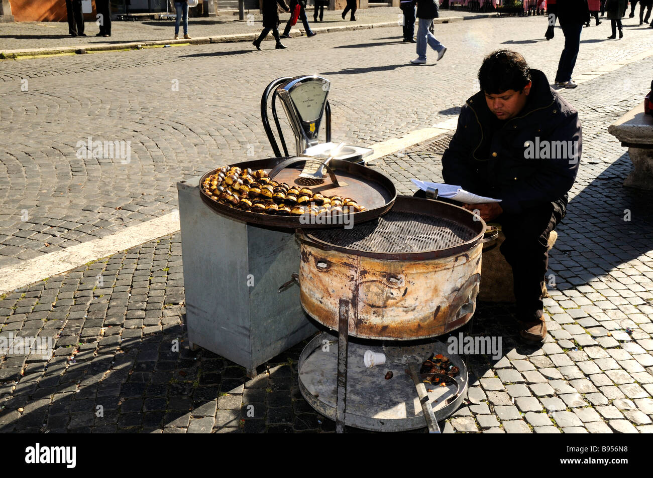 Hot Chestnut Seller in the Piazza Navona in Rome Italy Stock Photo - Alamy