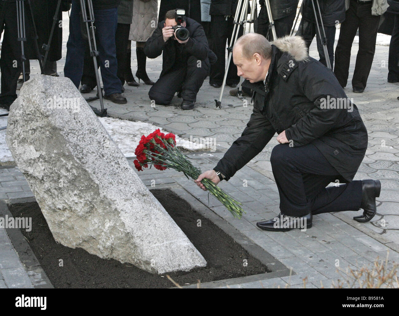 President Vladimir Putin laying flowers to the official Stone of ...