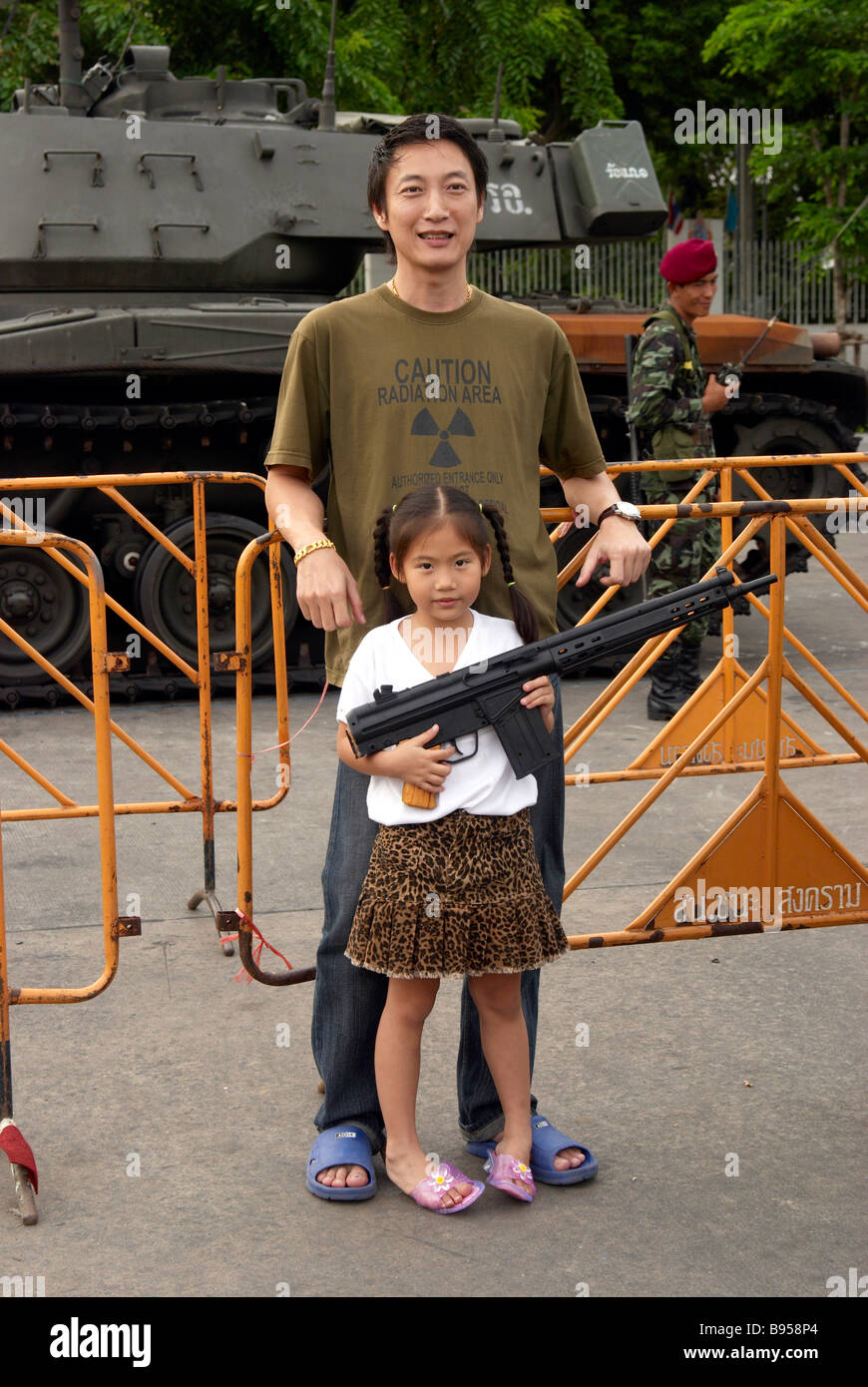 Coup soldier tank girl gun Stock Photo - Alamy