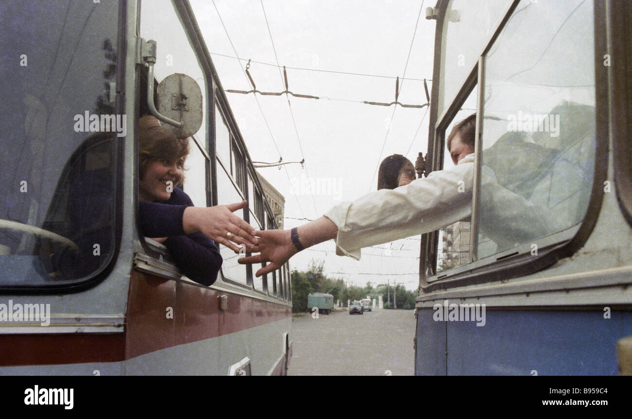 Moscow trolley bus drivers greet each other at the entrance to the ...