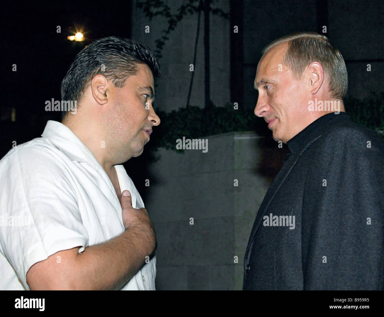 President Vladimir Putin and Lyube singer Nikolai Rastorguyev after the ...
