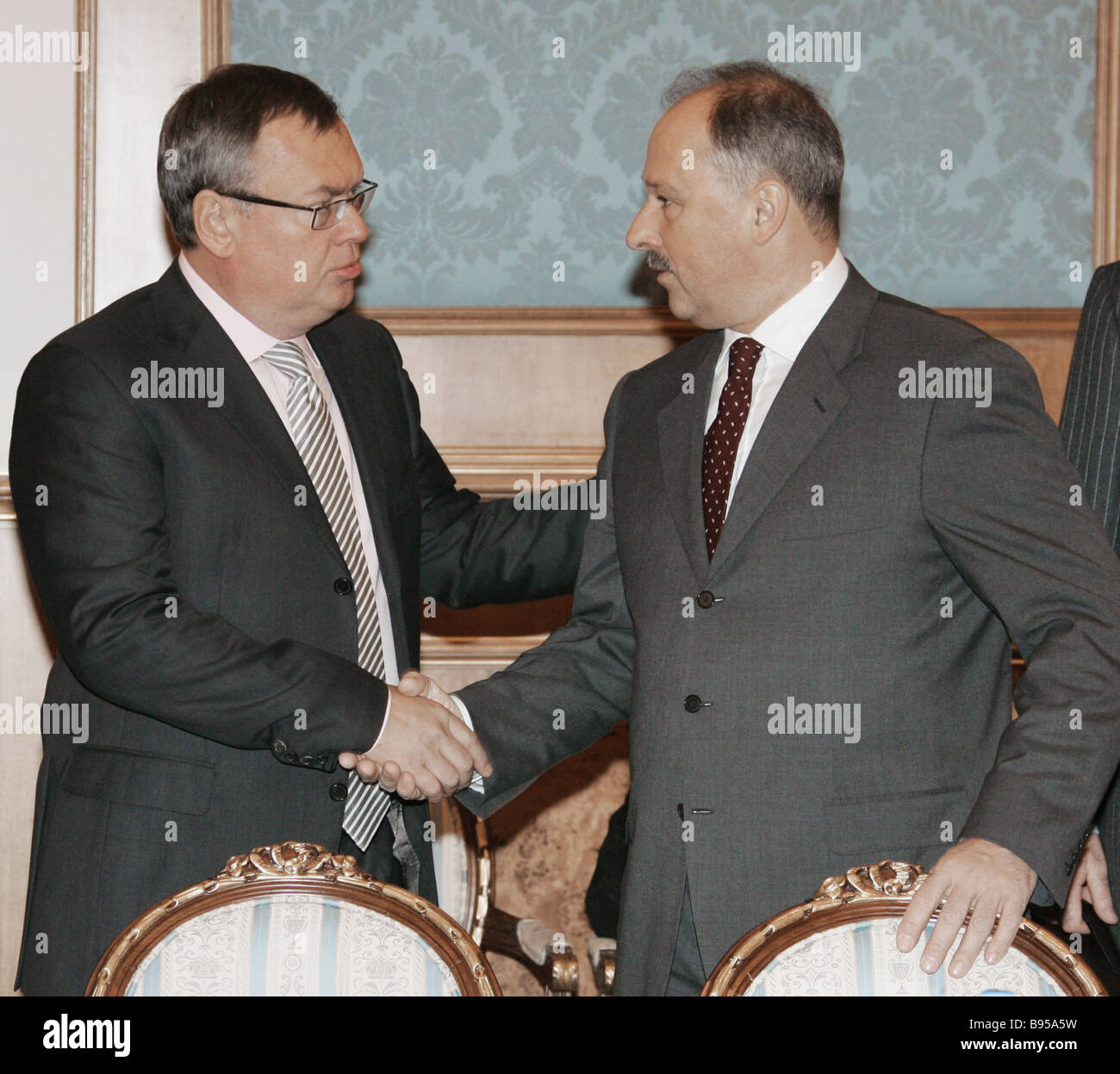 Bank VTB Board Chairman Andrei Kostin left and Vnesheconombank CEO ...