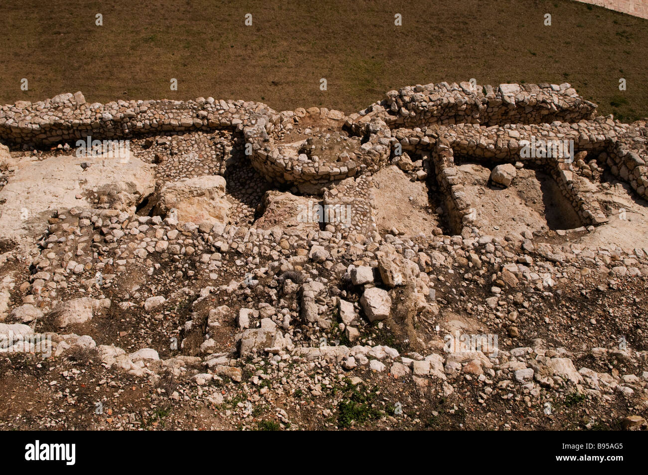 Ancient ruin at foothill facing the Kidron Valley in Pool of Siloam or ...