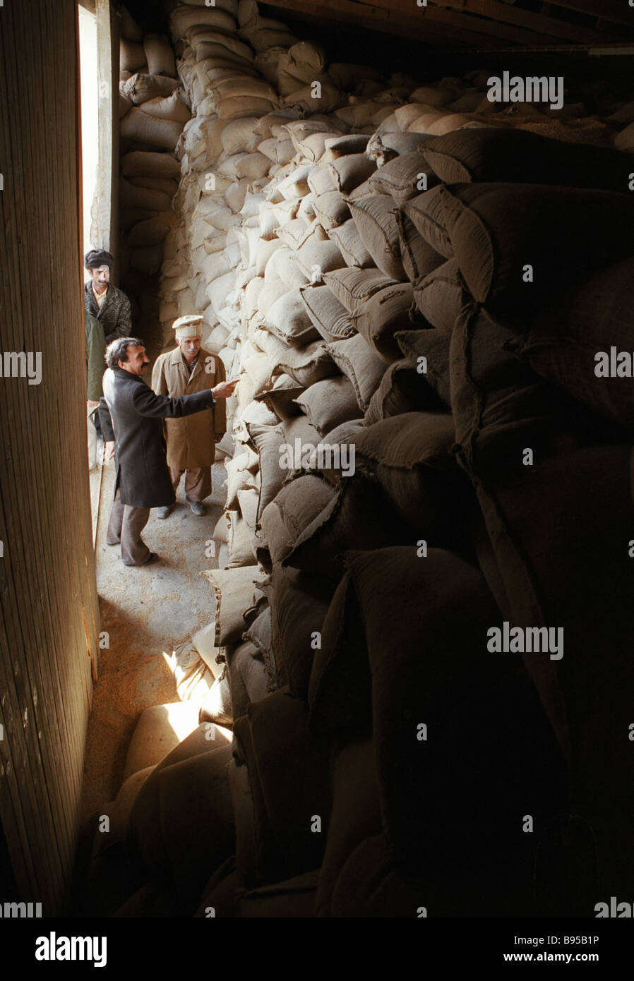 Bags of Soviet grain earmarked for Afghan population Stock Photo - Alamy
