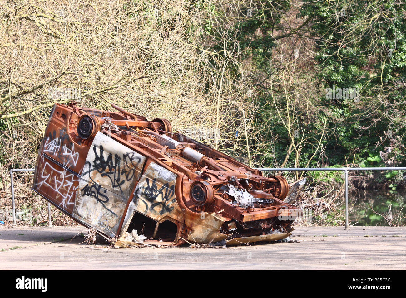 Upside down junked vehicle Stock Photo - Alamy