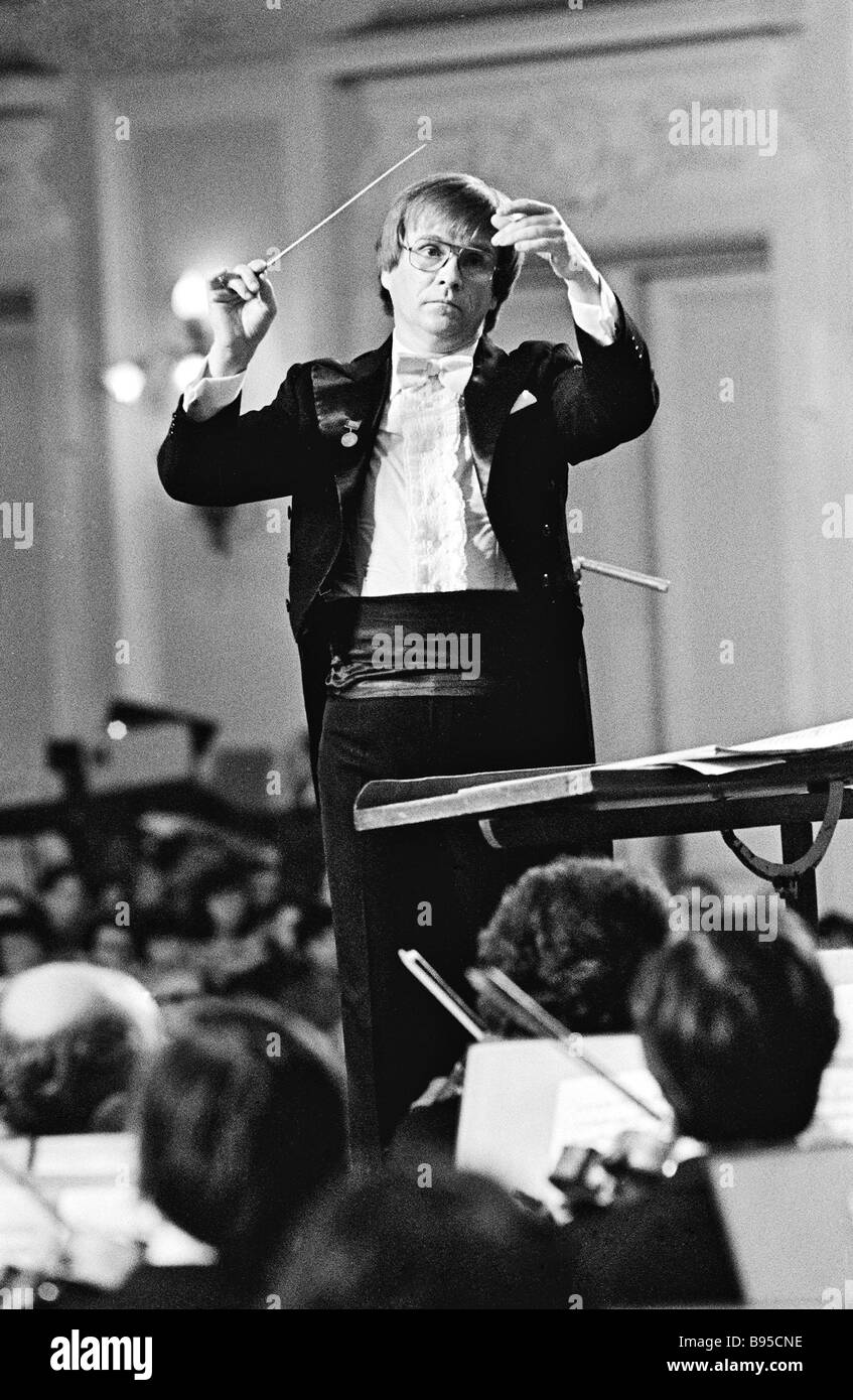 Russian conductor Vladimir Fedoseev directing an orchestra at the First ...