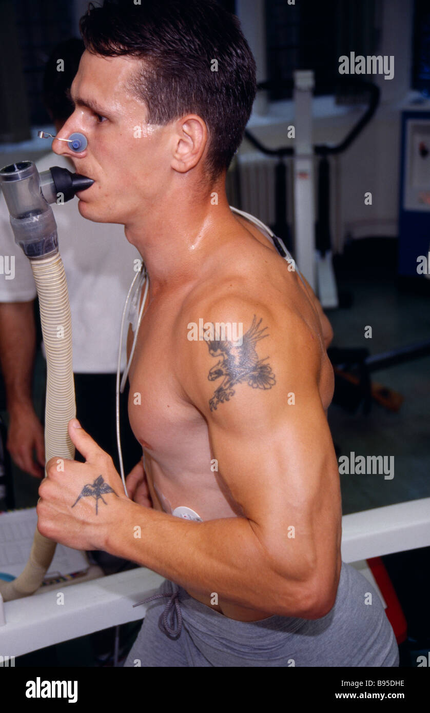 SPORT Athletics Health Medical Male athlete running on treadmill for ...