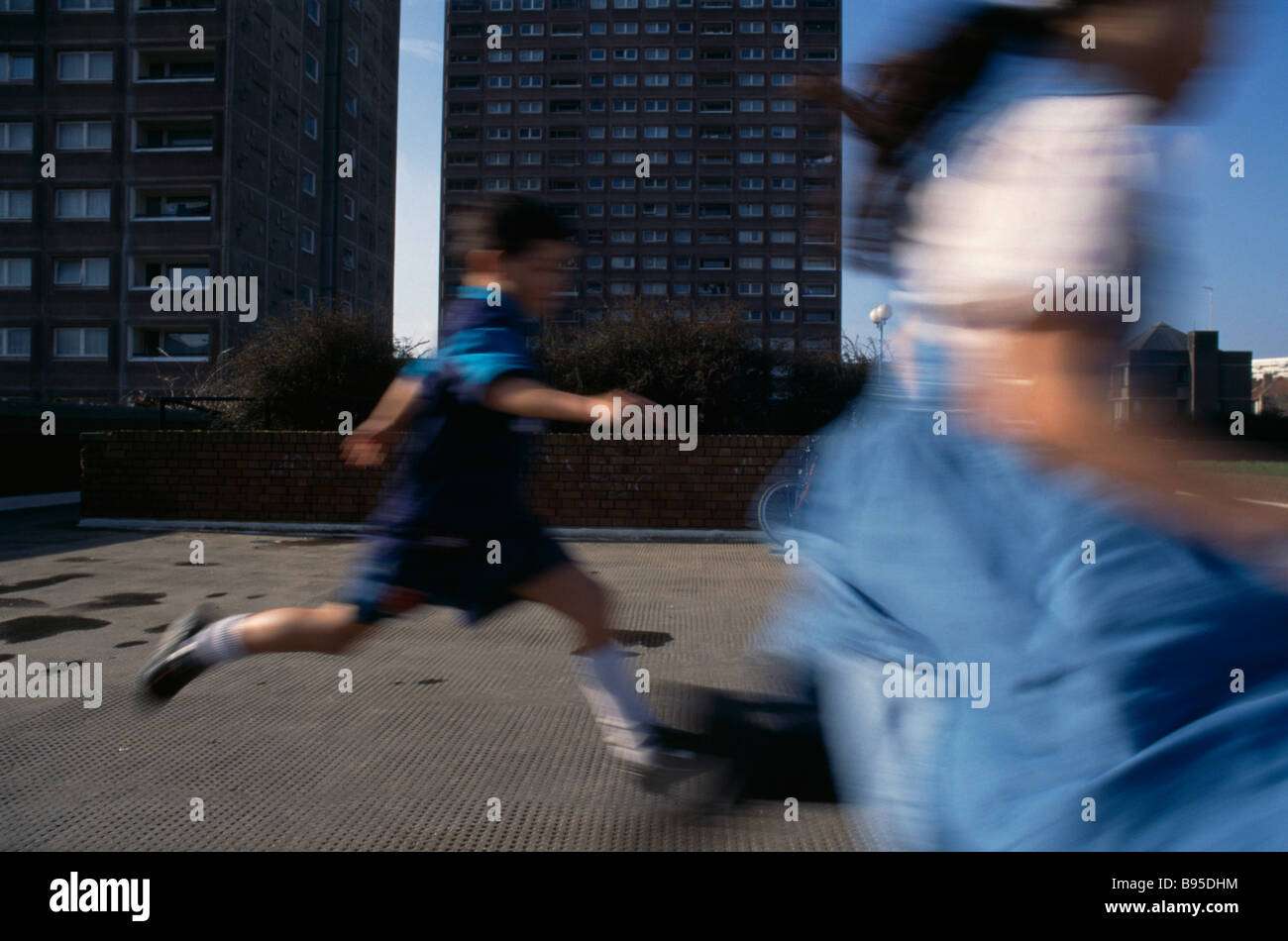 SPORT Running Children Children running in blurred movement in urban ...