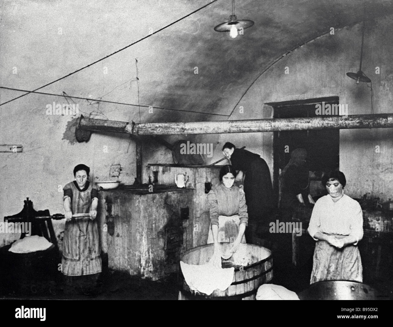 Workers at a laundry Stock Photo - Alamy