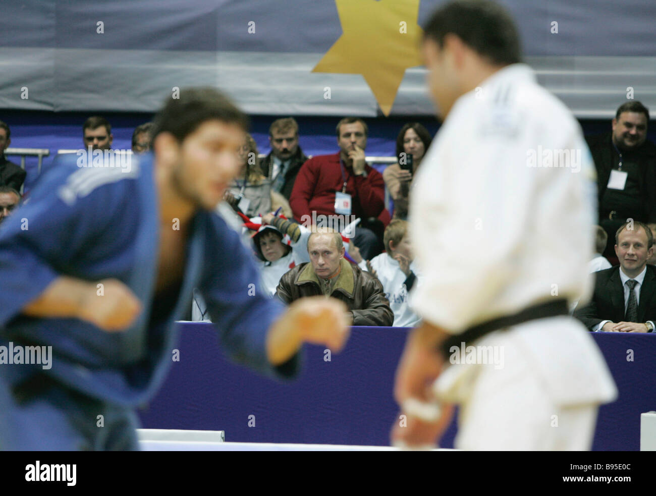President Vladimir Putin center background in the stalls of the Druzhba ...