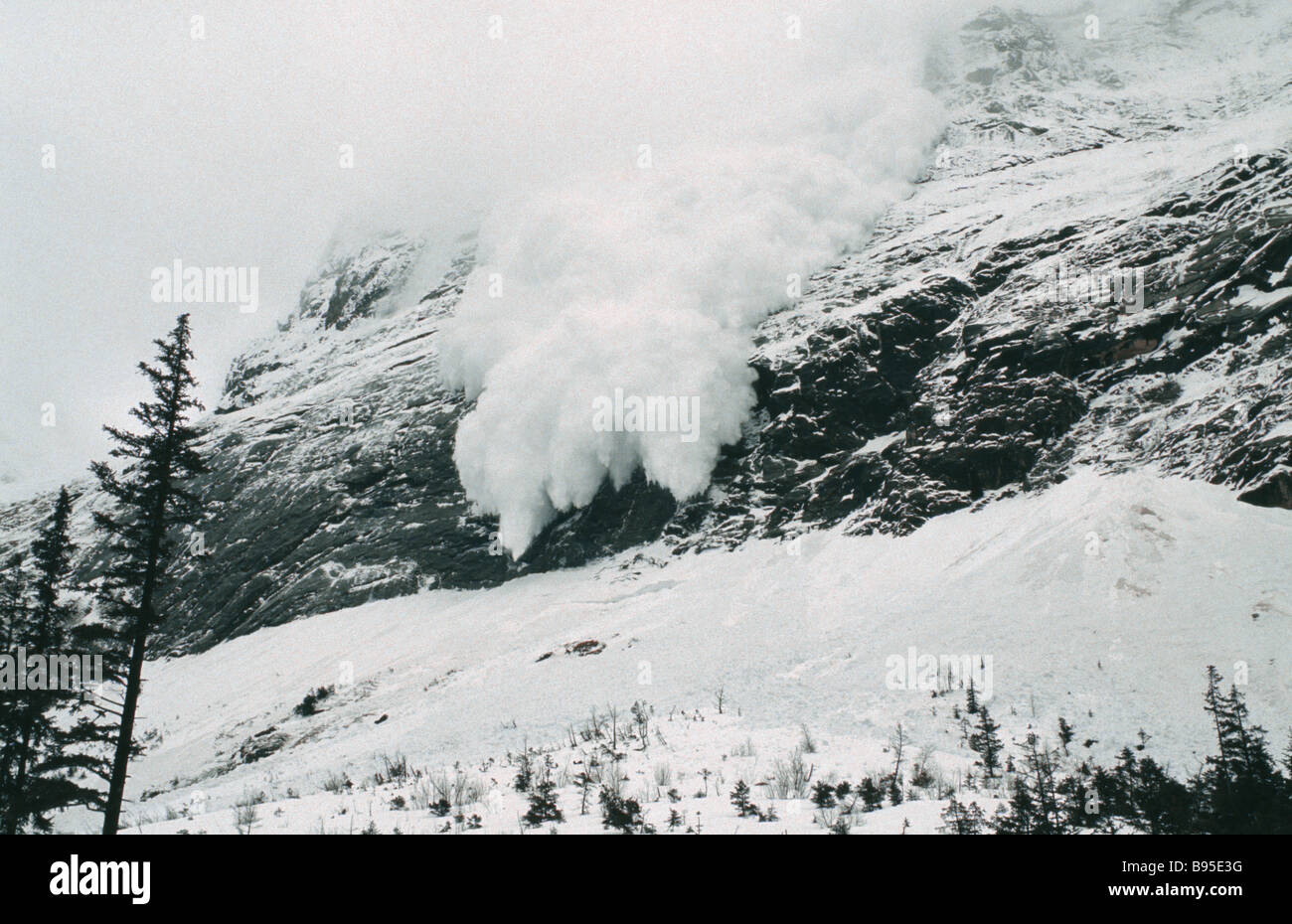 FRANCE French Alps Trois VallŽes Avalanche of snow crashing down steep ...