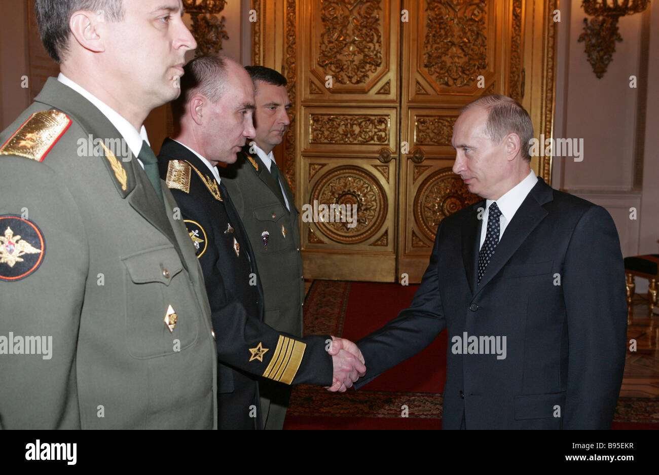 Commander in Chief of the Navy Vladimir Vysotsky second left and ...