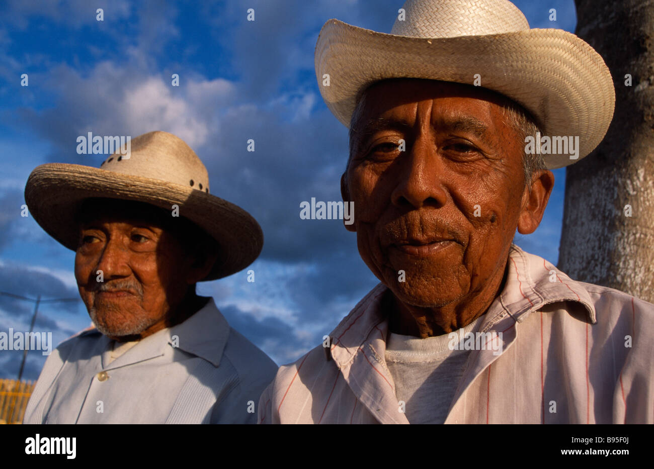 MEXICO Yucatan Hoctœn Two smiling elderly men in hats head and ...