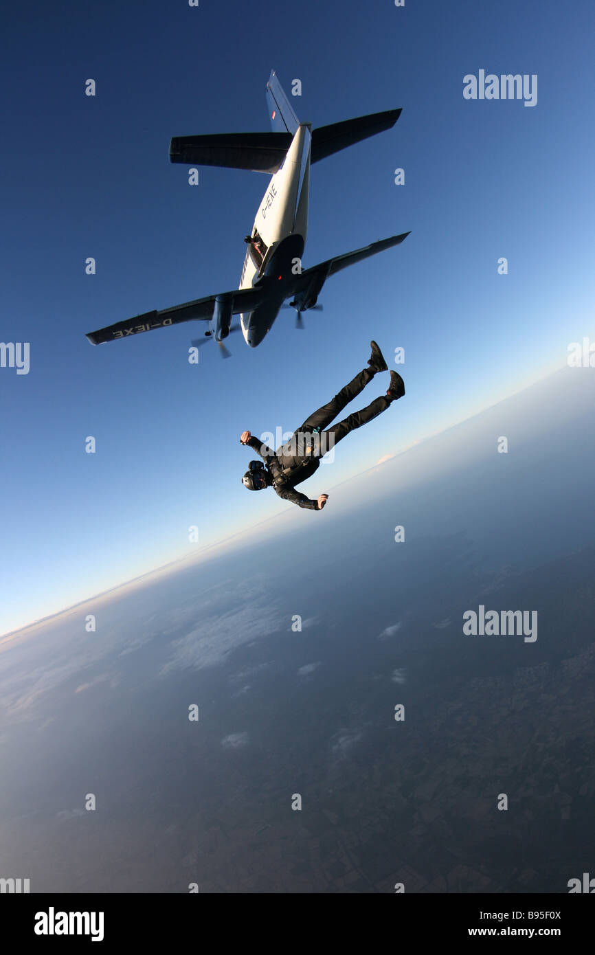 Sky diving from a small plane Stock Photo - Alamy