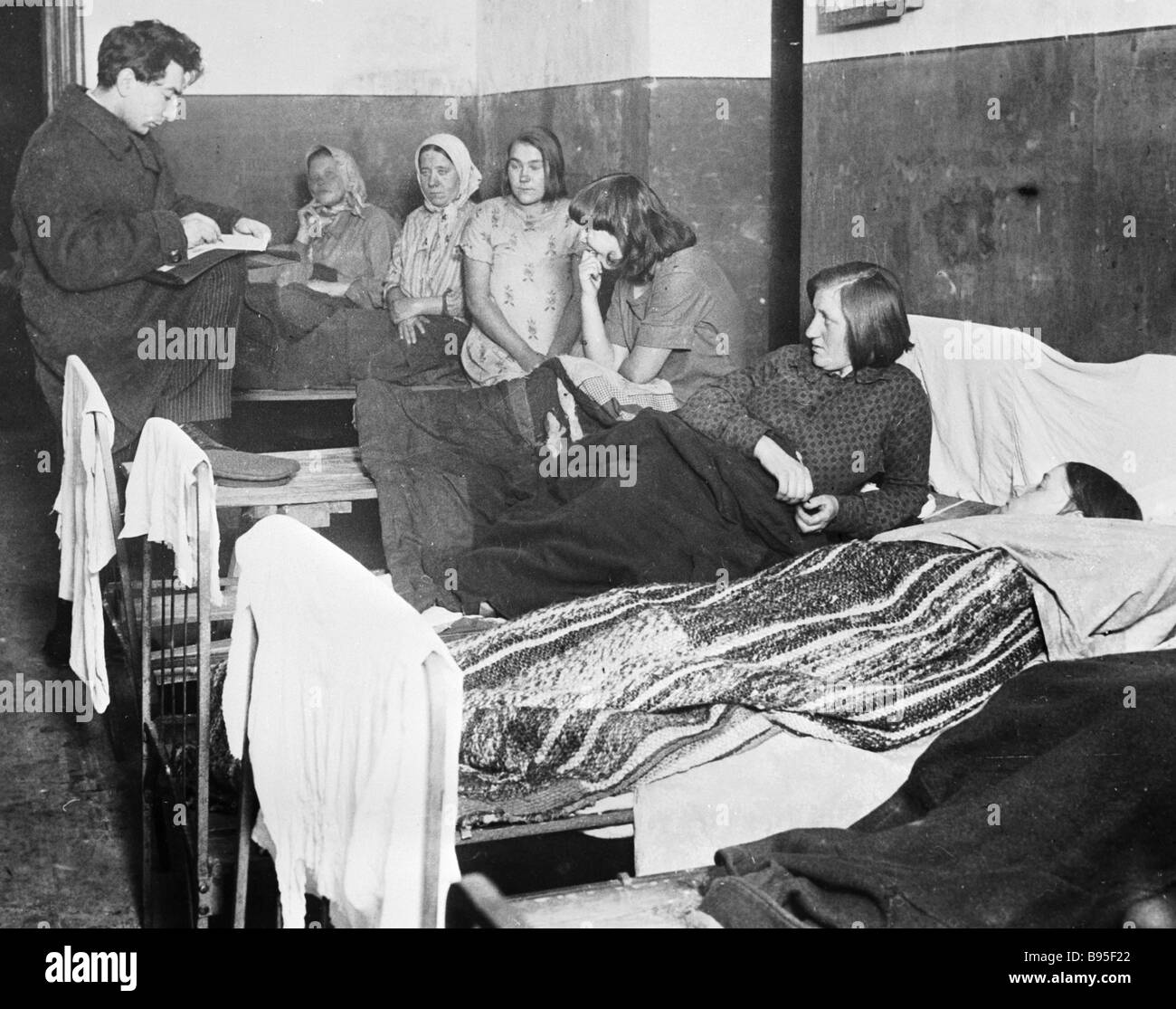 Women census in a doss house Stock Photo - Alamy
