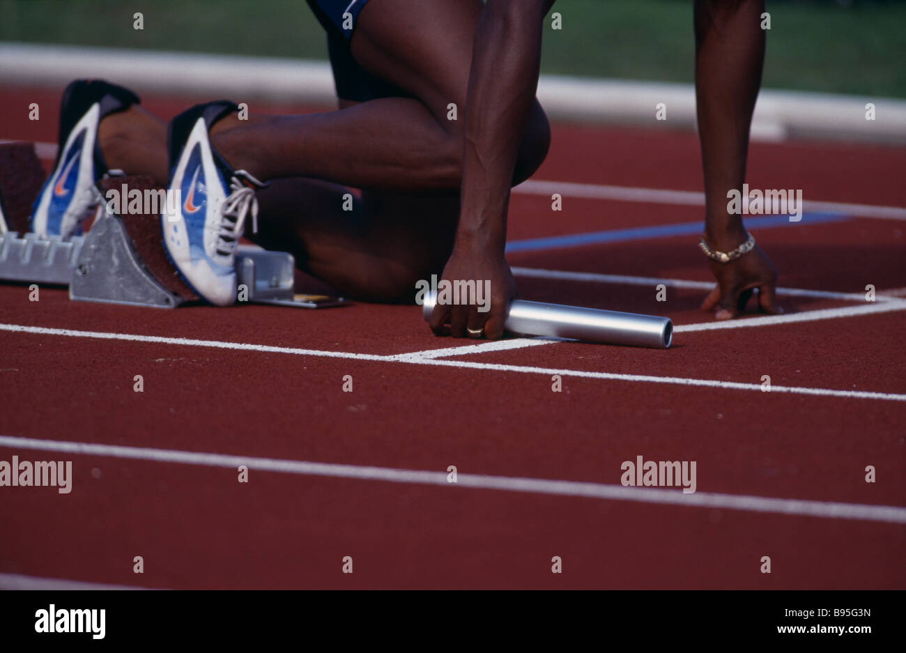 SPORT Track And Field Athletics Running Detail of lower half of runner ...
