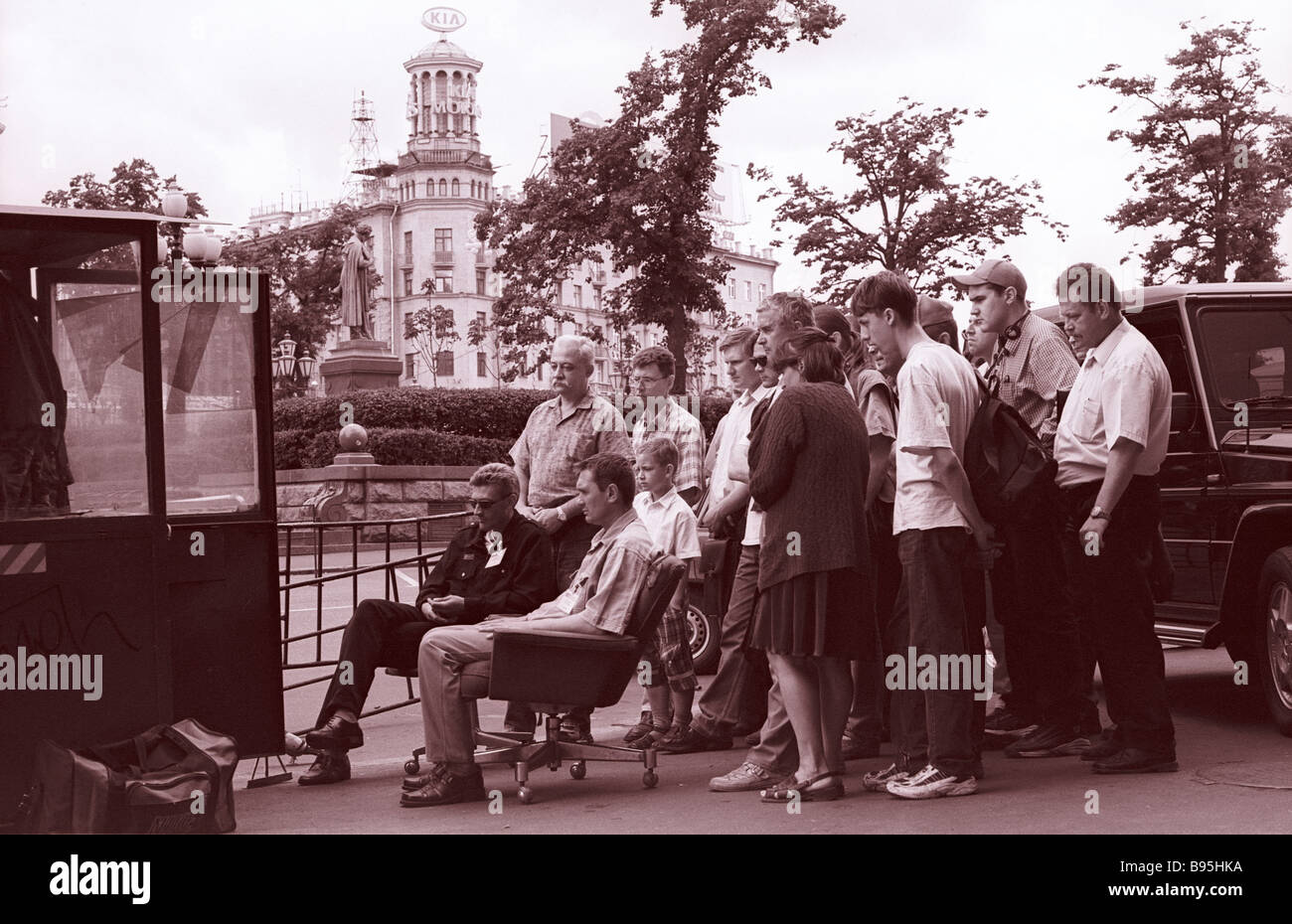 Watching a TV program Stock Photo - Alamy