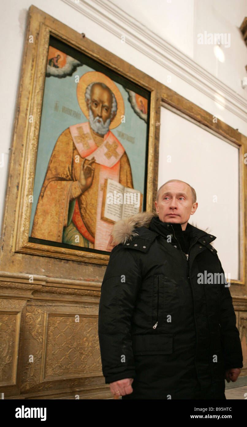 President Vladimir Putin visiting the Trinity Cathedral of the Troitsko ...