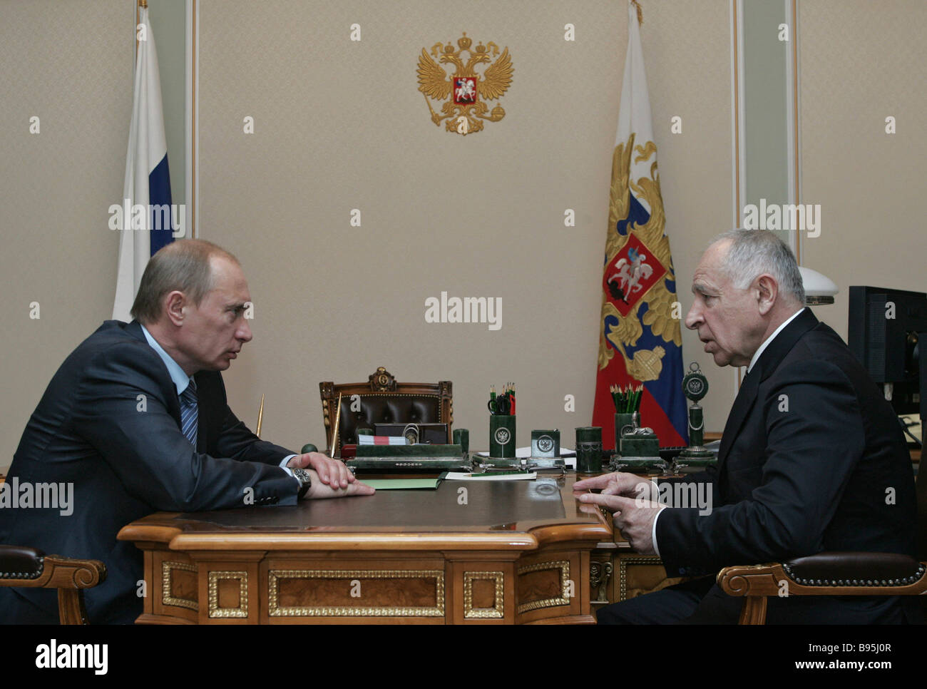 Russian President Vladimir Putin left and President of Dagestan Mukhu ...