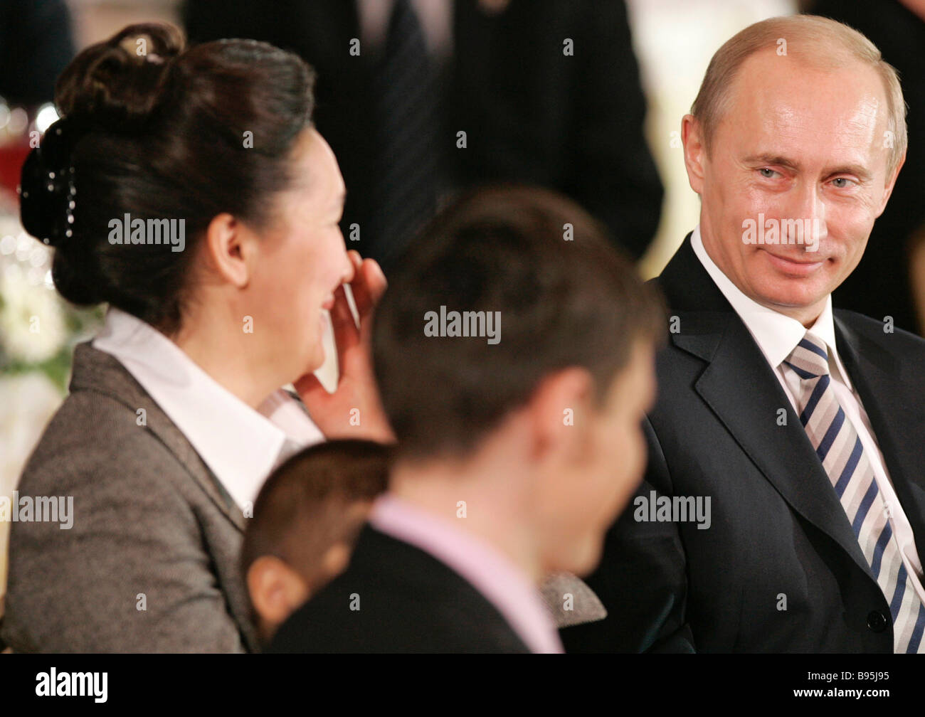 Russian President Vladimir Putin right attending the Year of the Family ...