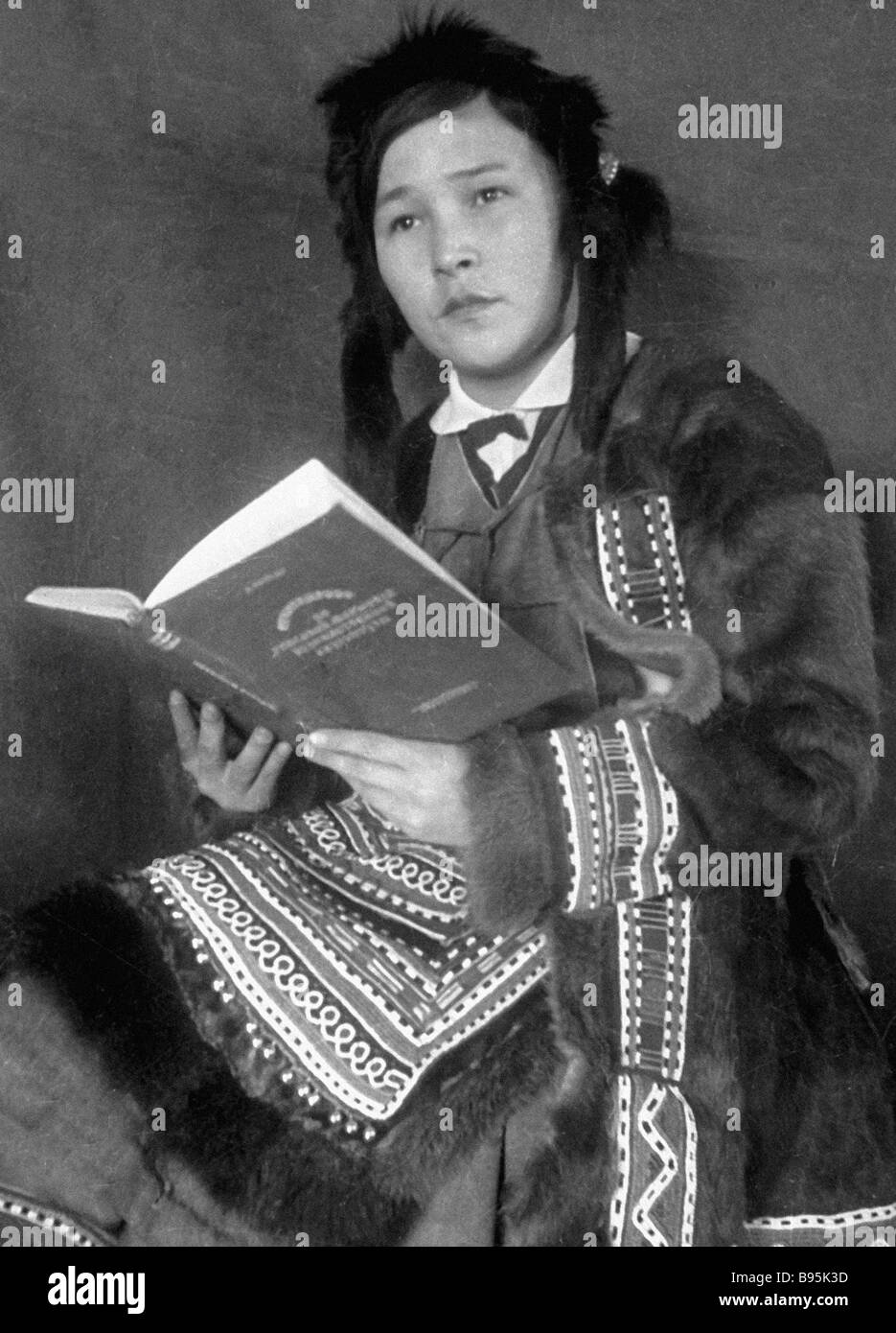 The first Eskimo teacher Valentina Kogan reading a book Stock Photo - Alamy