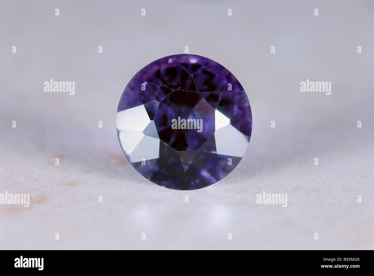 Spinel 'violet' gemstone specimen Stock Photo - Alamy