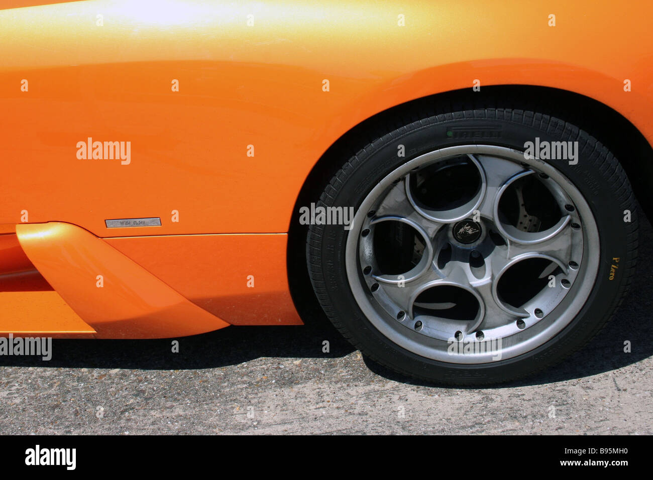 Orange racing car hi-res stock photography and images - Alamy