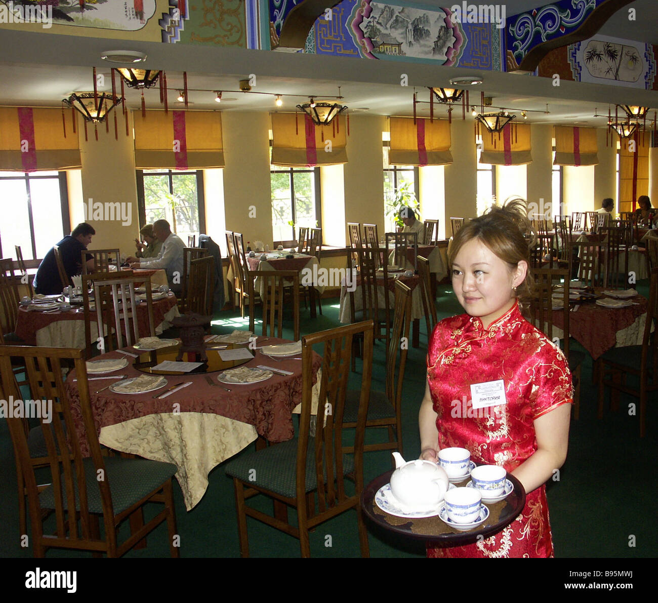 Chinese Waitress High Resolution Stock Photography and Images - Alamy