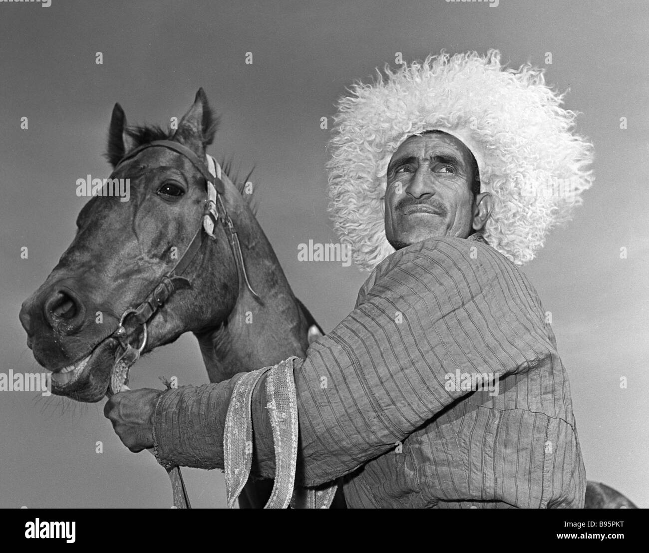 A Kazakh groom in folk costume Stock Photo - Alamy