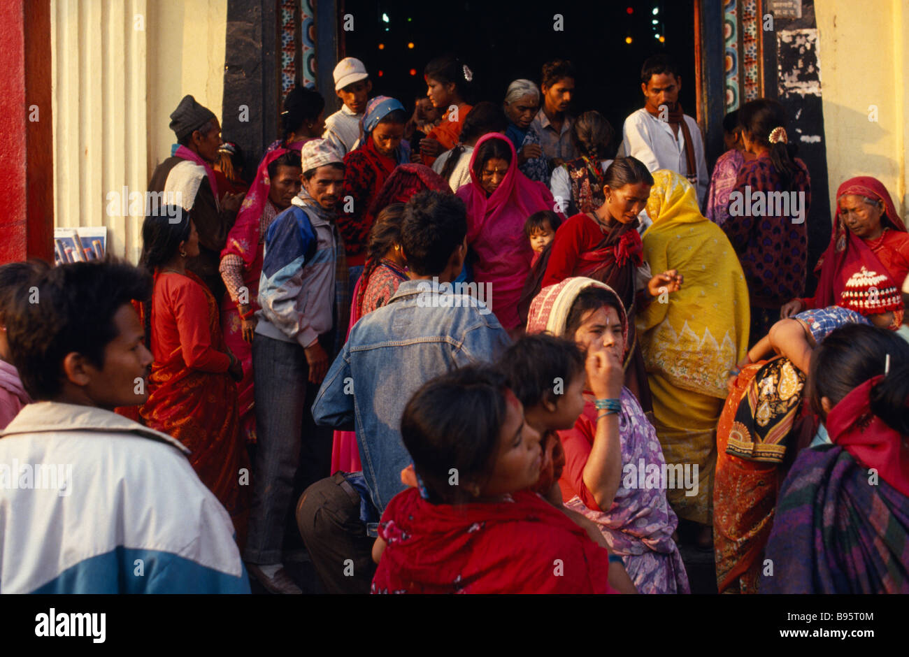 NEPAL Kathmandu Colourful crowd scene at temple entrance Stock Photo ...