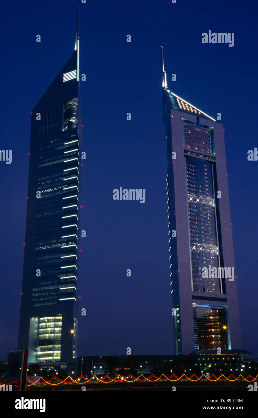 UAE Dubai Emirates Tower illuminated at night with coloured lights in ...