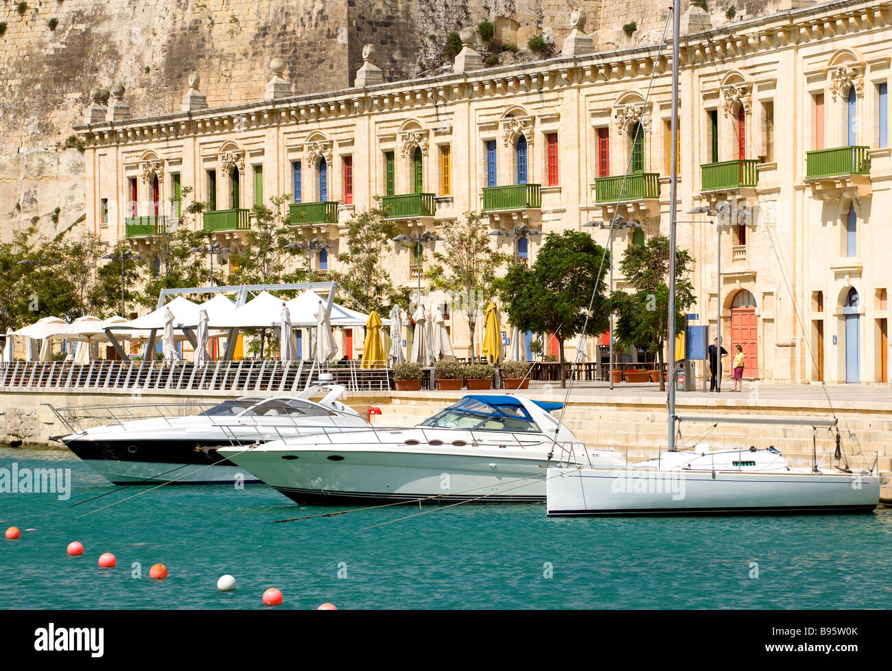 MALTA Valletta Boats at dockside in marina by restored waterfront old ...