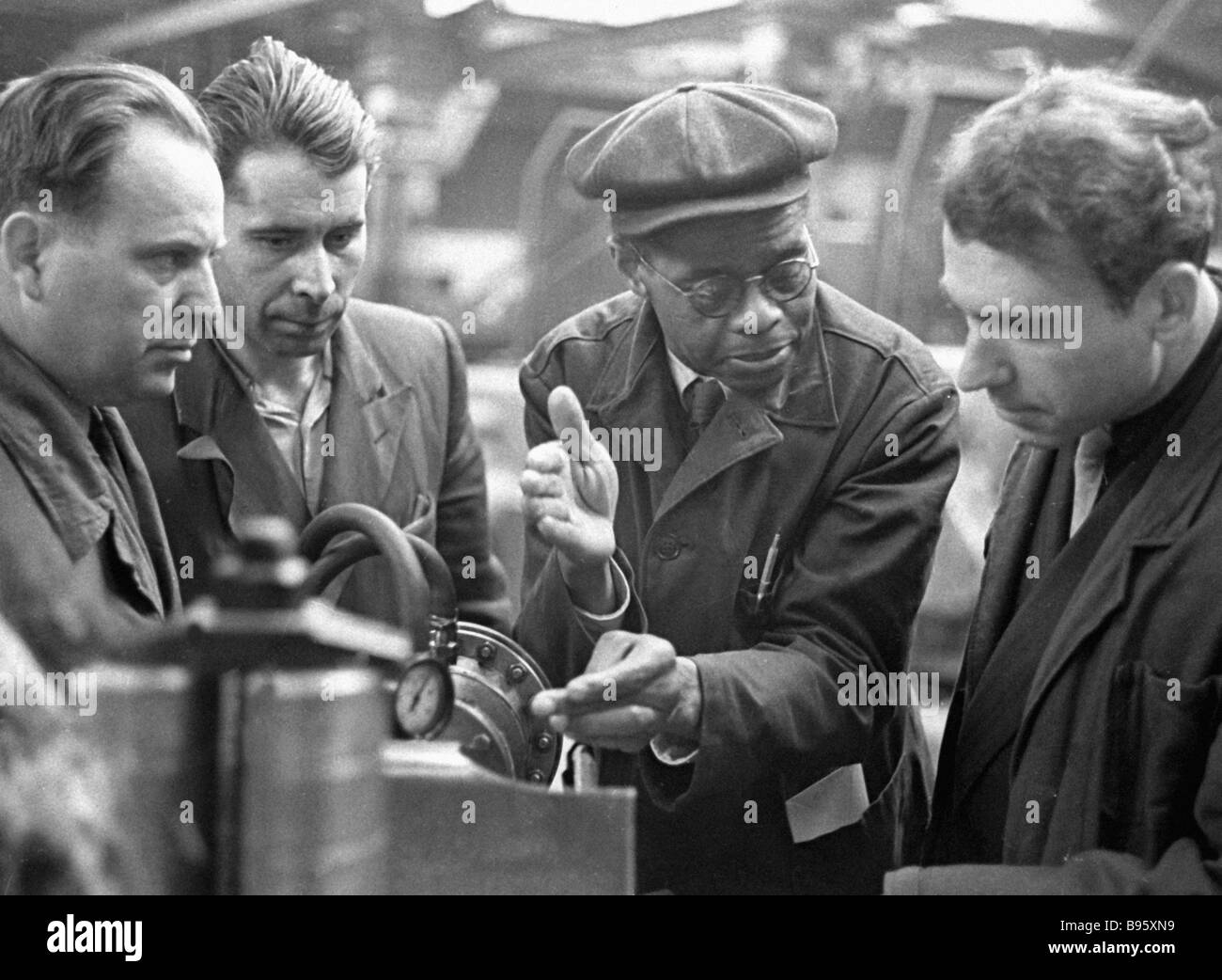 Engineer Robert Robinson of First State Bearing Plant second right ...