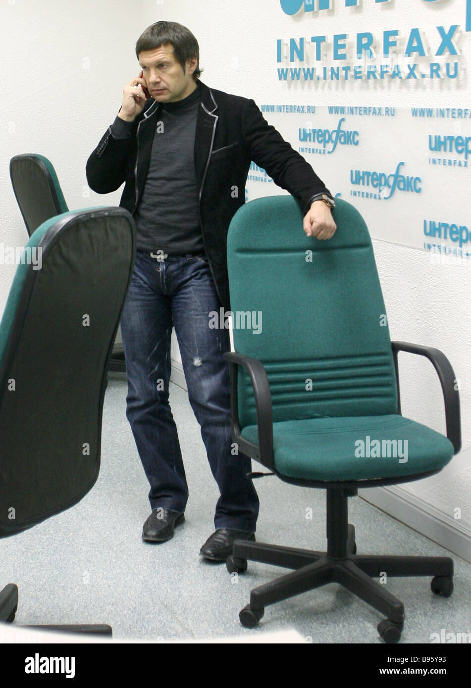 Journalist Vladimir Solovyev addressing a news conference at Interfax news agency on his new ...