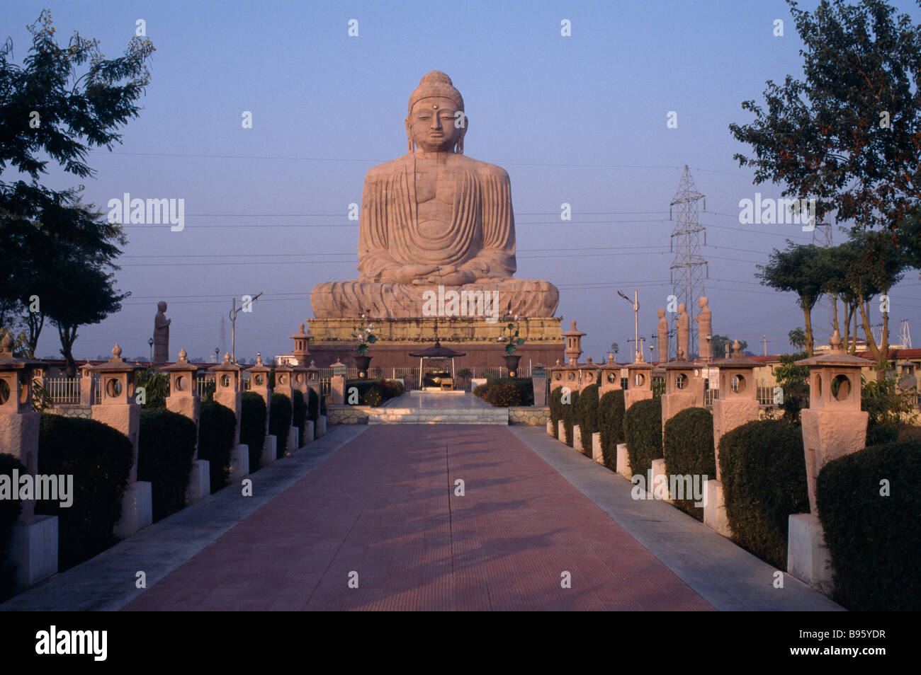 INDIA Bihar Bodh Gaya Giant seated Buddha statue seen from pathway ...
