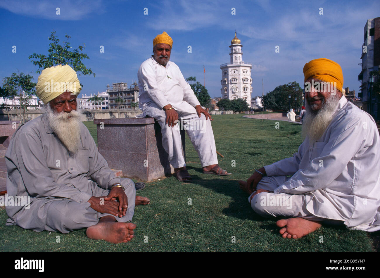 INDIA South Asia Punjab Amritsar Golden Temple Three elderly Sikh men ...