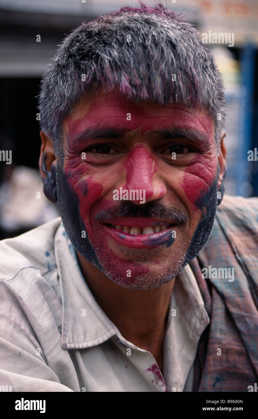 INDIA Delhi Head and shoulders portrait of man with face covered in ...