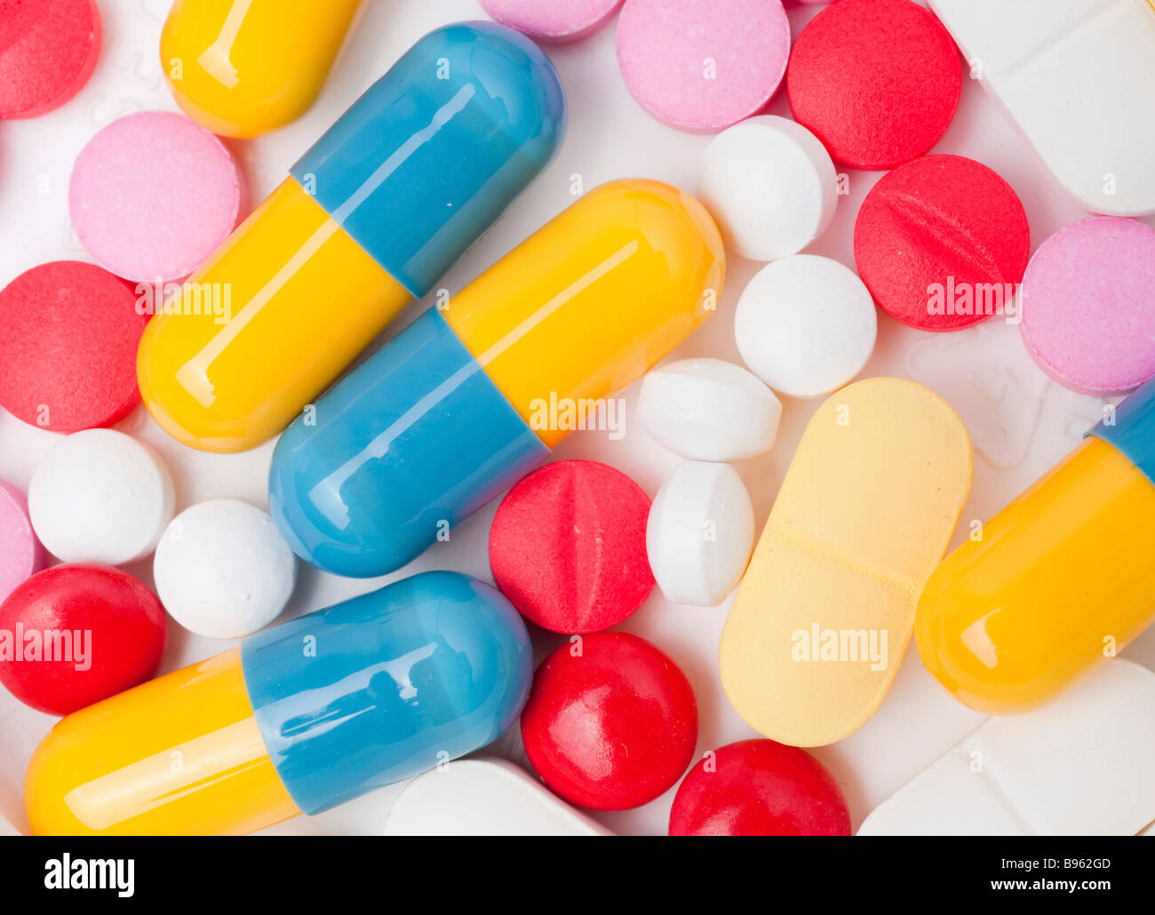 an assortment of pills and capsules on white background Stock Photo - Alamy