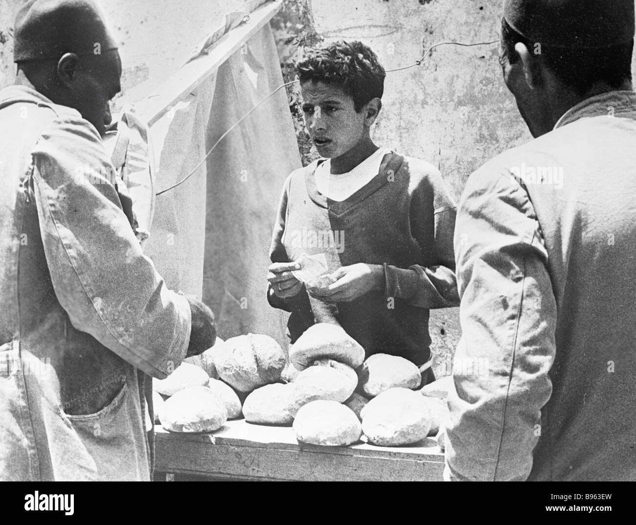Bread vendor at Tripoli s city bazaar Stock Photo - Alamy
