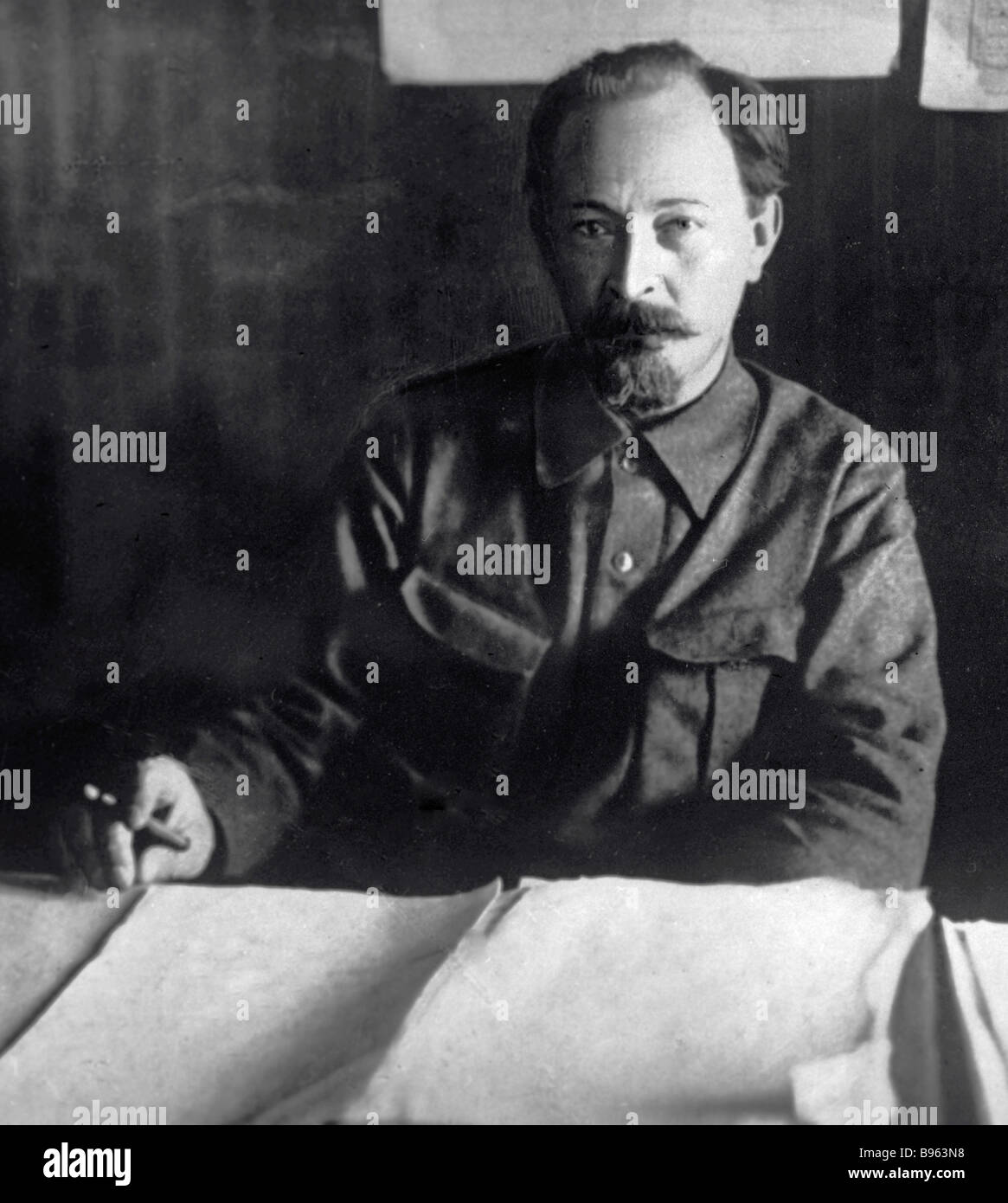 Felix Dzerzhinsky at his writing desk Stock Photo - Alamy