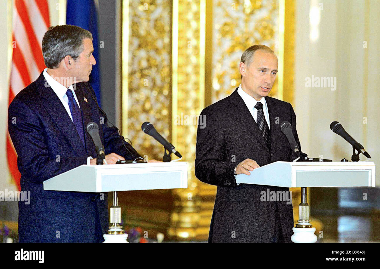 President Vladimir Putin and President Bush at a joint news conference ...