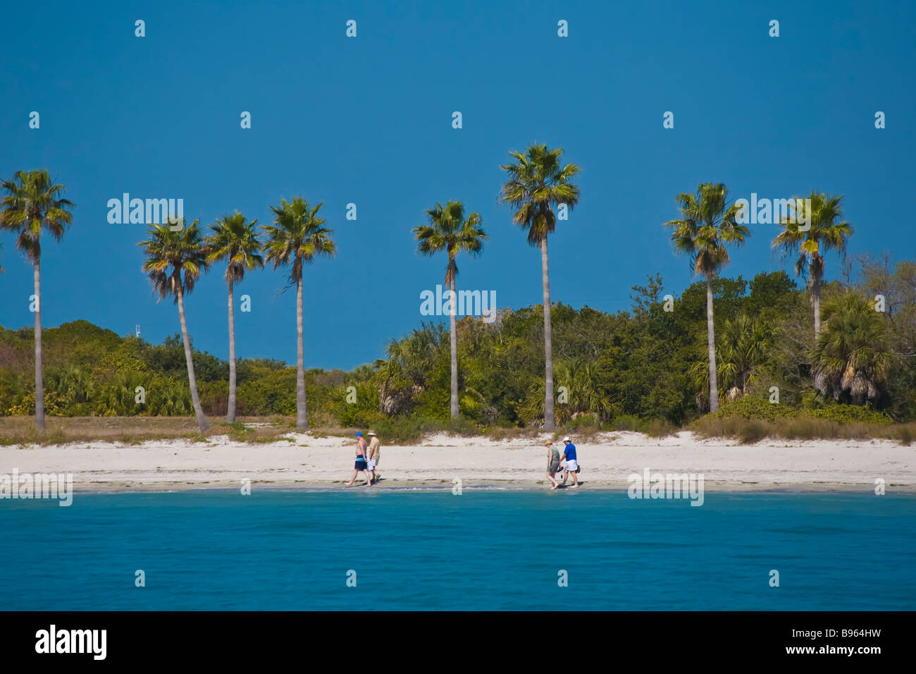 People walking on beach at Fort Desoto State Park in St Petersburg ...