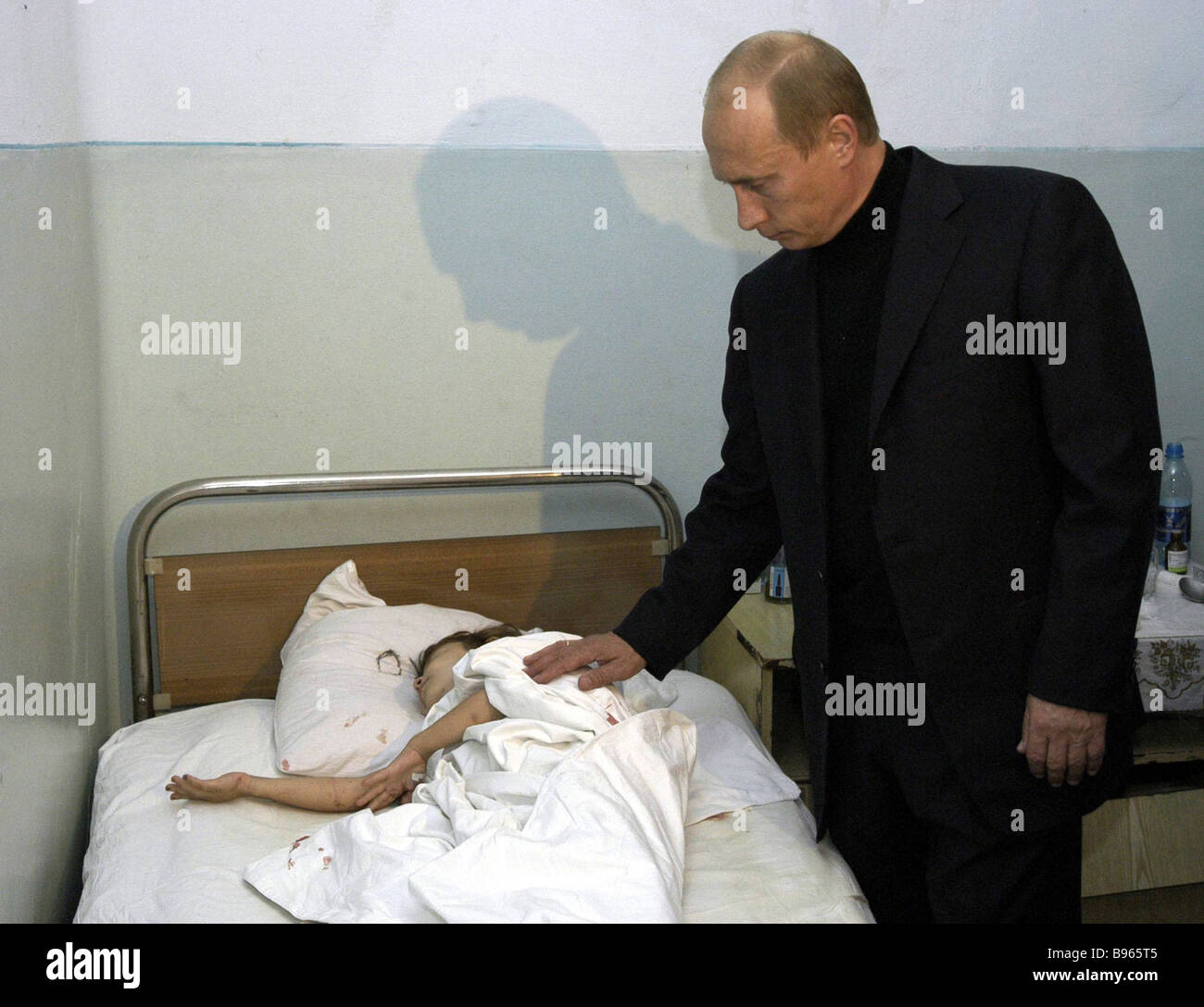 Russian President Vladimir Putin visiting the hospital where people who ...
