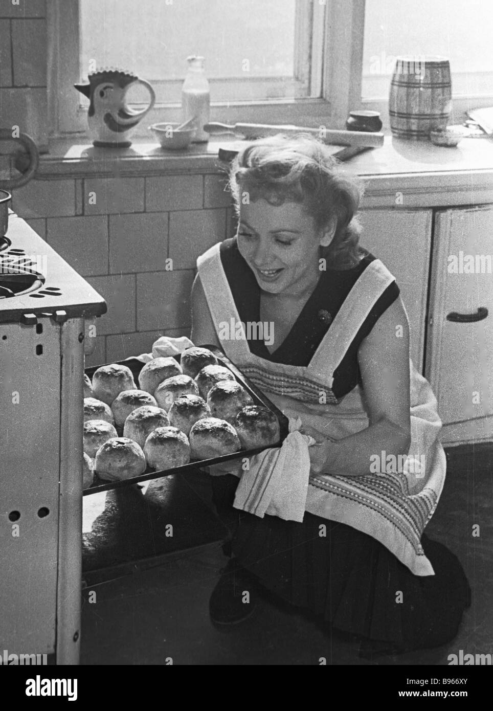 Actress Lidiya Smirnova baking pies in her kitchen Stock Photo - Alamy